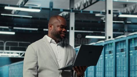 Data Center System Administrator Reviewing Code For Automation Scripts Stock Footage Video Of