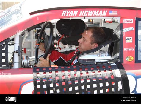 Ryan Newman Gets Out Of His Car After Winning The Pole During