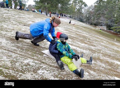 From Left Zac Holtgrieve Pushes Wyatt Williams And Fletcher Holtgrieve Down One Of The Hills As