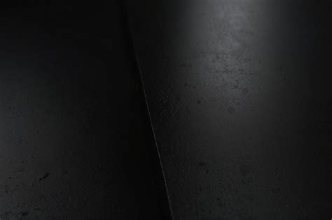 Glossy Matte Black Surface With Smooth Finish And Refined Dark Texture For Creative Uses