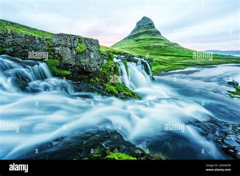 Incredible Landscape With Kirkjufellsfoss Waterfall And Kirkjufell