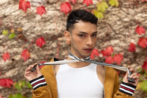 Premium Photo Portrait Of Biracial Transgender Man Looking At Camera