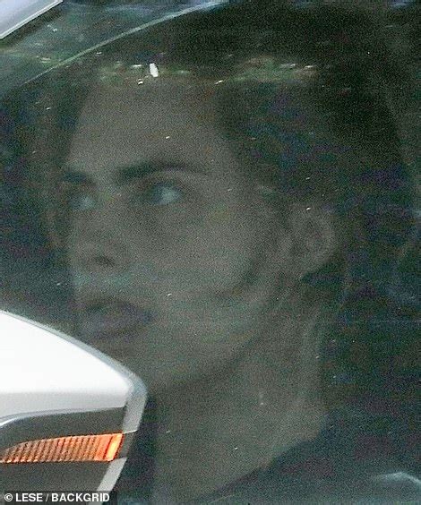 Cara Delevingne Looks Out Of Sorts While Smoking And Taking Drops Of An