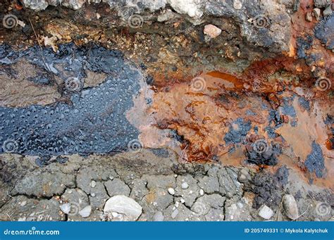 Texture Of Crude Oil Spill On The Surface Of The Soil Royalty Free