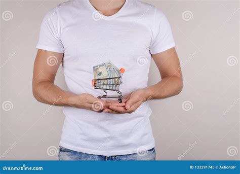 Cropped Closeup Picture Photo Of Small Trolley With Wheels In Ha Stock