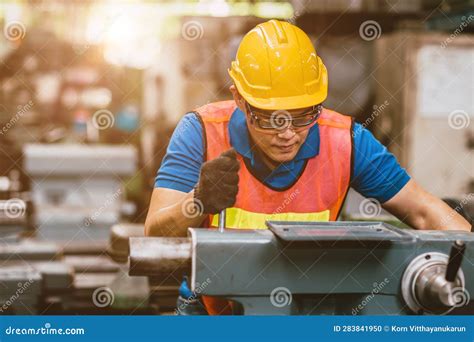 Professional Asian Male Staff Skill Worker Focus Precision Detail