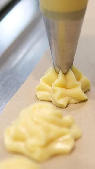 Choux Pastry For Eclairs Making Small Eclairs With Help Of Pastry Bag Piping Choux Dough For