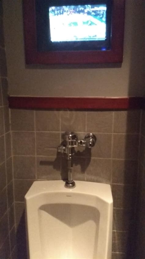 This Urinal Has A Tv Above It So You Dont Miss Any Part Of The Game