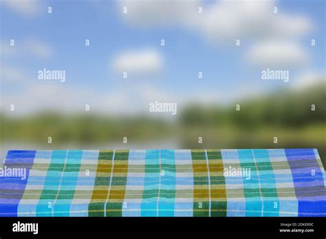 Empty Table Product Empty Wooden Deck Table Covered With A Blue Checkered Tablecloth Over