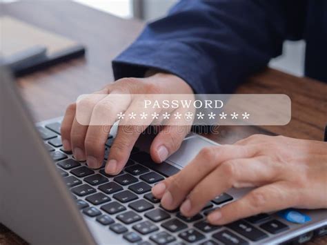 User Typing Password On A Laptop To Access Personal User Data On The