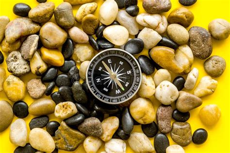 Sea Journey Travelling And Vacation Concept Compass On Rocks And