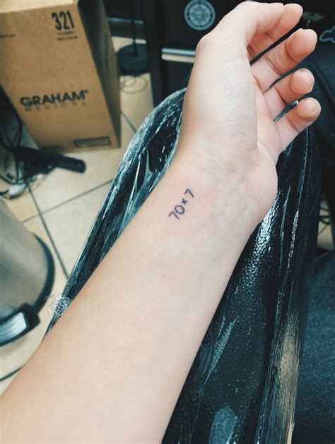 70 X 7 Tattoo 22 Tattoo Tattoos With Meaning 70x7 Tattoo Design