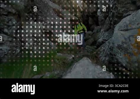 Man Hiking Down Rocky Pass Tracing Floating Route Line And Map Icons For Travel Marketing