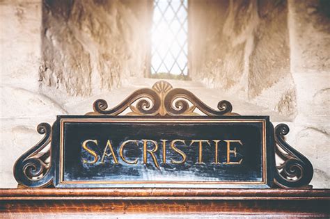 Closeup Of Sacristy Entrance Sign Text In French Language In Old