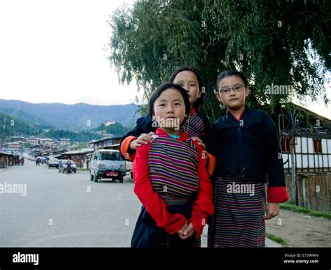 Young Girls Wearing Traditional Kira Dresses In Bumthang Bhutan Stock