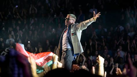 Macklemore Tells Seattle Crowd ‘f— America At Concert Donating To