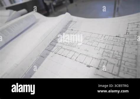 Open Blueprints Stretch Across Drafting Table Architectural Layout