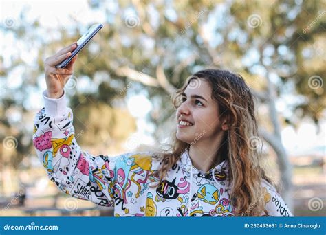 Pretty Smiling Teenager Girl Taking A Selfie Young Girl Outdoors Stock