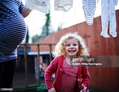 Laundry Mom Daughter Photos And Premium High Res Pictures Getty Images