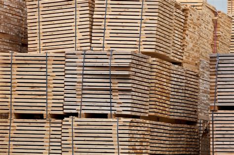 Premium Photo New Wooden Stacked Pallets