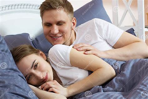 Husband Wakes His Beloved Beautiful Wife In The Morning In Bed Couple