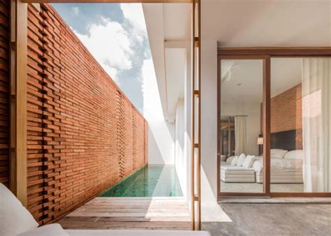 Fluted Brick Walls Frame Views Above Boutique Thailand Hotel