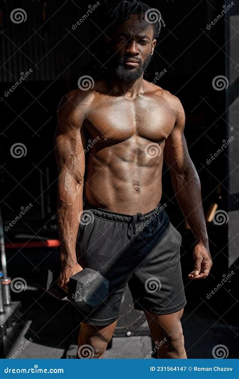 Powerful Strong African Athletic Men Pumping Up Muscles Workout