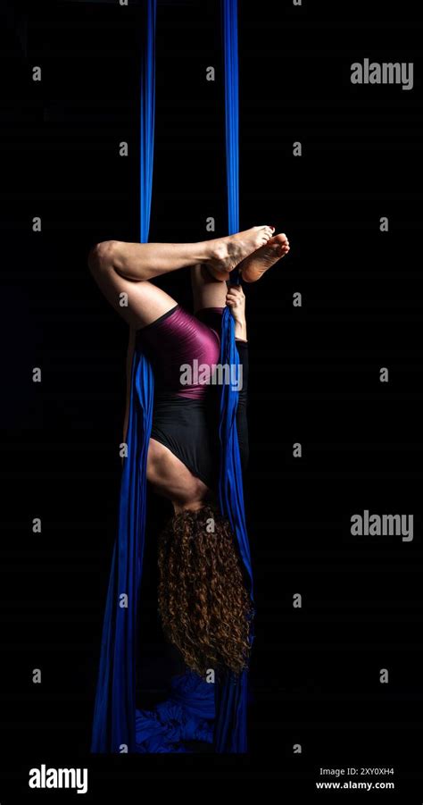 Back View Of Unrecognizable Woman Performing An Aerial Modern Dance