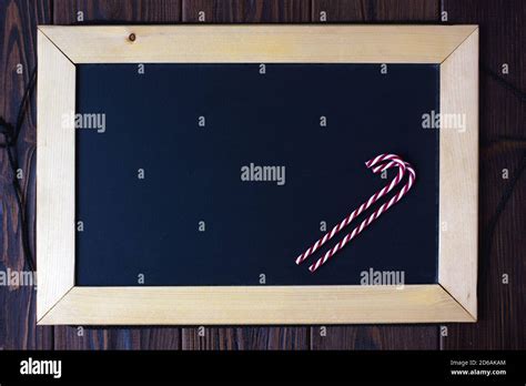 Blackboard With Place For Your Text With Candy Cane In One Coner Stock