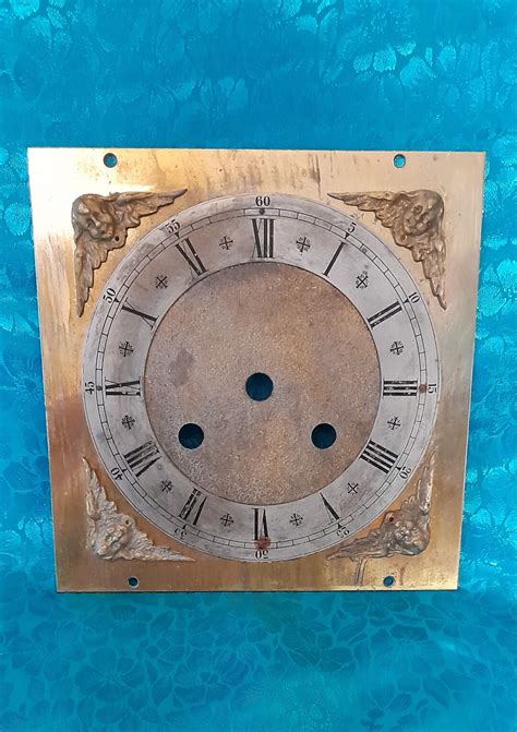 Solid Brass Clock Face With Steel Dial And A Cherubs Head And Wings