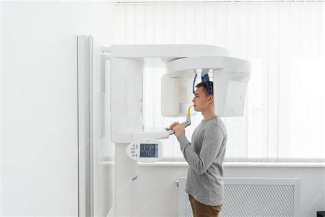 Premium Photo A Young Man Has A Computed Tomography Of The Jaw A