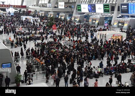 Passengers Wait For Their Trains To Go Back Home For The Chinese Lunar