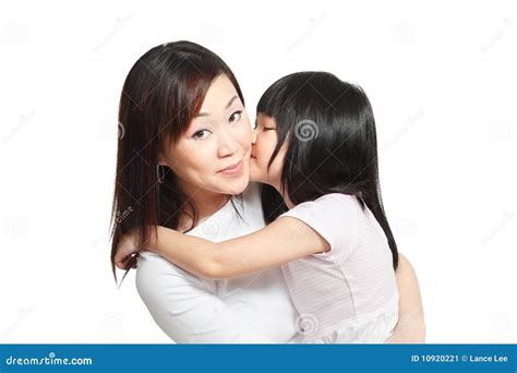 Chinese Girl Kissing Asian Mother Against White Stock Image Image Of