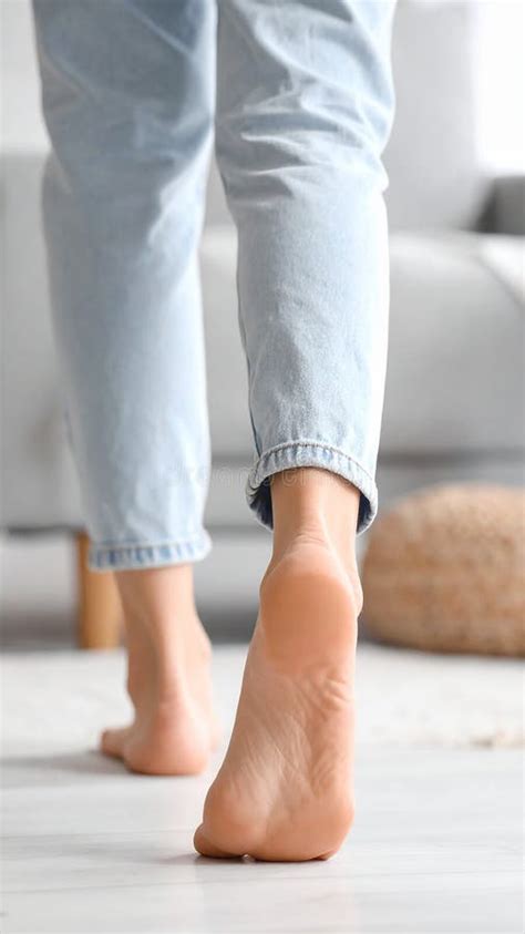 Young Woman Walking Barefoot At Home Closeup Heating Concept Stock