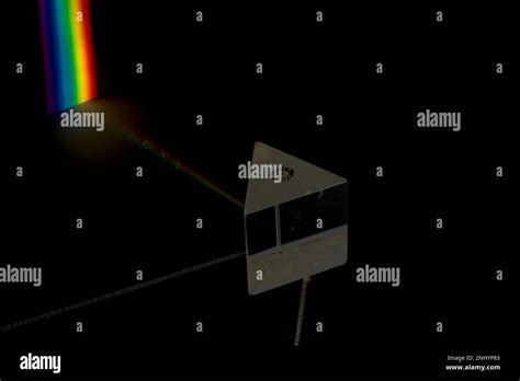 Beam Of White Light Being Split By An Equilateral Glass Prism