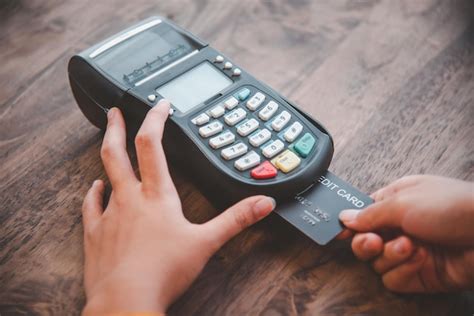 Premium Photo High Angle View Of Woman Using Mobile Phone On Table