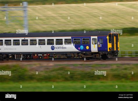 A British Rail Class 158 Seen Here Passing Through Colton Junction Near