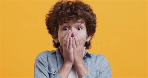 Unbelievable Close Up Portrait Of Amazed Boy Opening Mouth In Shock