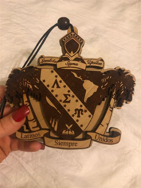 Sigma Lambda Upsilon Shield