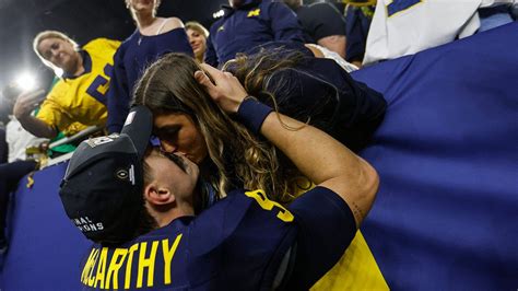 Michigans Jj Mccarthy Shares Smooch With Girlfriend After Winning National Championship Fox News