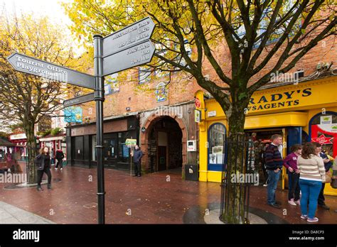 Street Signs Point To Tourist Attractions In Downtown Areas Of Killarney Town In Co Kerry