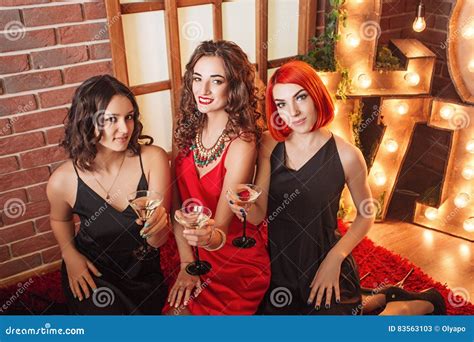 Three Girls Celebrating Their Birthday Hen Party In Identical Dress
