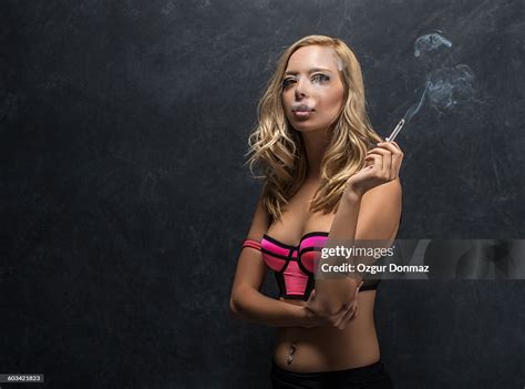 Women In Bras Smoking Cigarettes