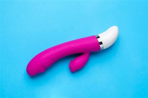 Pink Vaginal Vibrator On Light Blue Background Top View Sex Toy