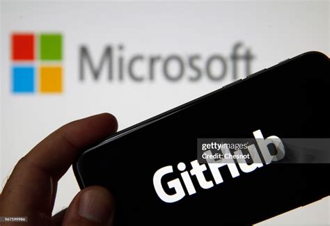 In This Photo Illustration The Github Logo Is Seen On The Screen Of