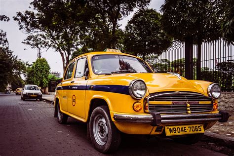 Download Kolkata Yellow Cab Wallpaper | Wallpapers.com