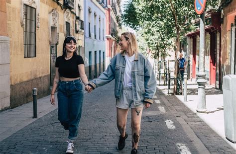 Lesbian Couple Holding Hands Walking On Street Free Photo Bebxp1