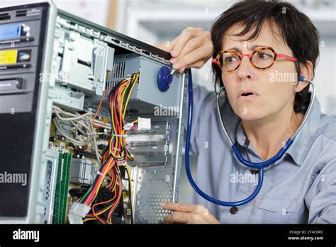 A Woman Checking A Computer Stock Photo Alamy