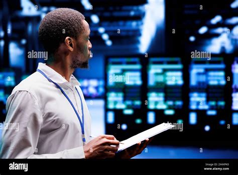 System Admin Checking Energy Efficient Supercomputers Hub Using Renewable Sources To Minimize