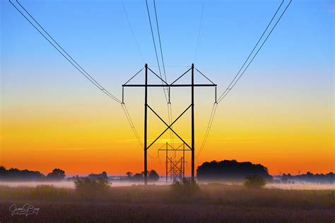 Electrical Grid Towers And Wires Filling The Dawn Sky Photograph By